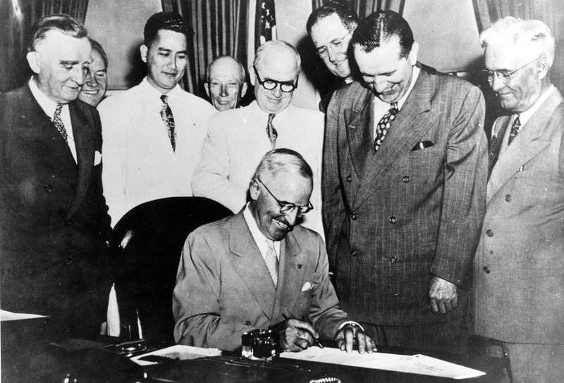 Truman signing Guam Civil Government Act | Harry S. Truman