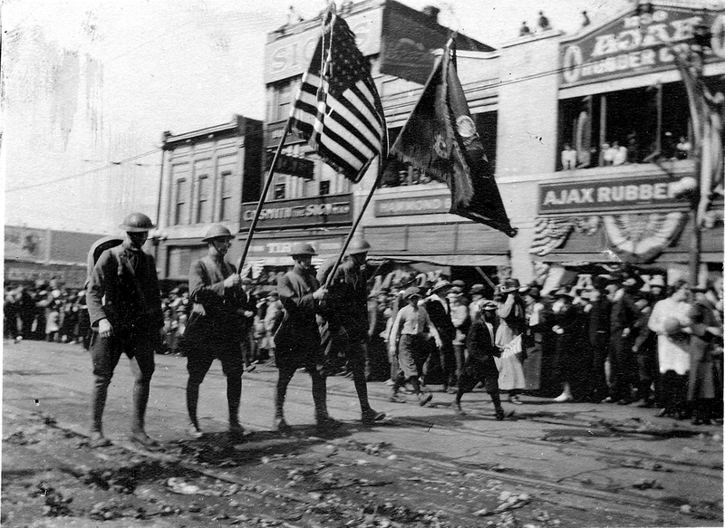 World War I Color Guard marching down a street in Kansas City, Missouri ...