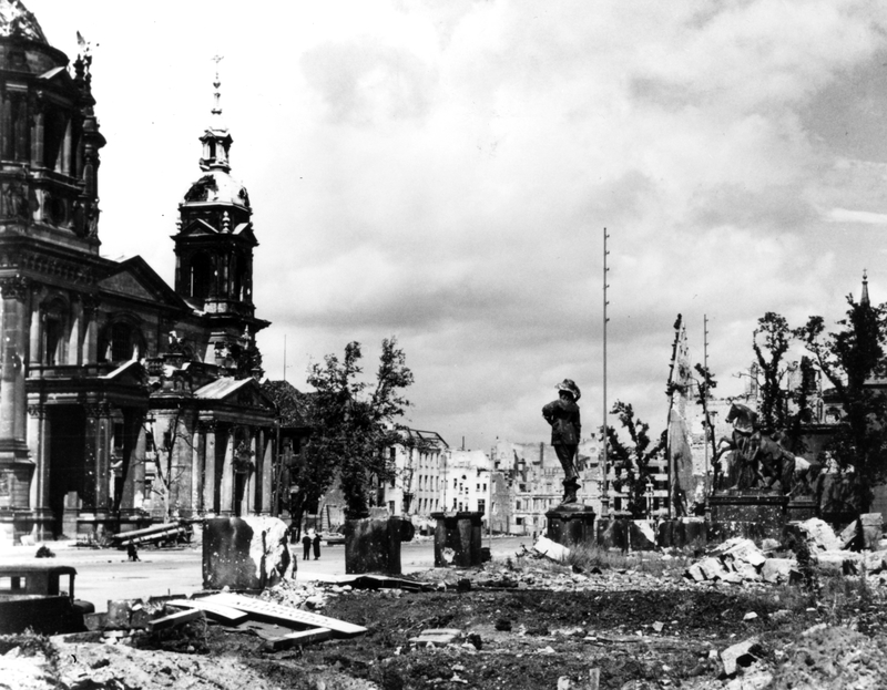 A street in Berlin lined with buildings and statues destroyed by ...