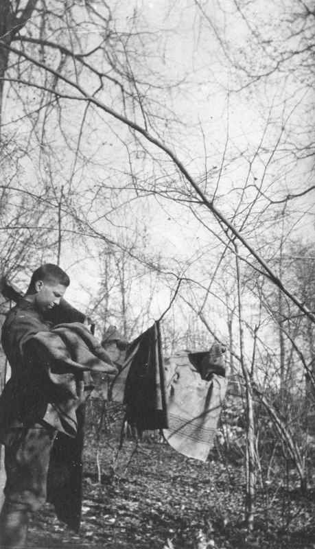 Soldier Hanging Clothes from Trees, "Daily Cootie Hunt" | Harry S. Truman