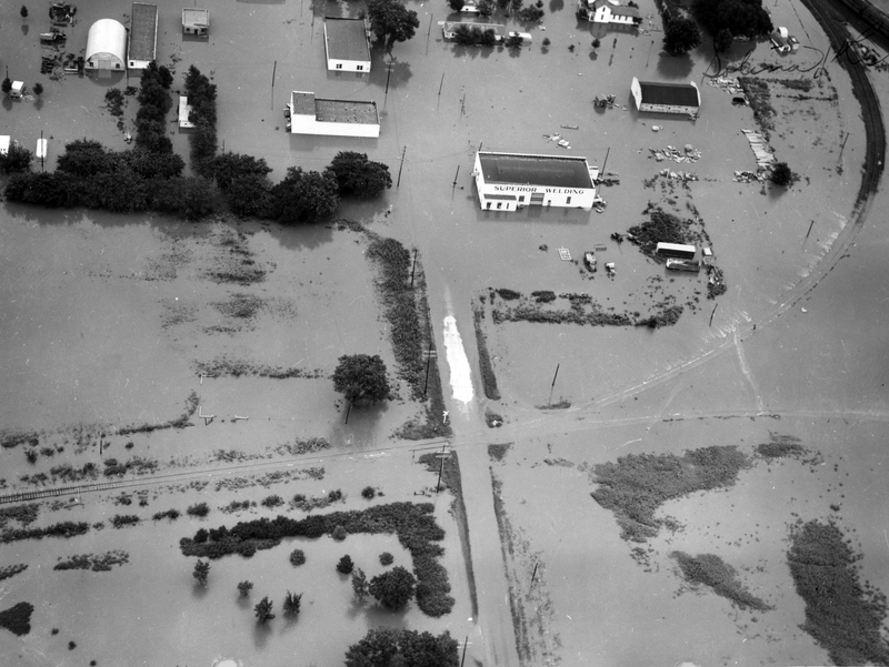 Aerial view of Salina, Kansas, inundated by high water during the flood ...