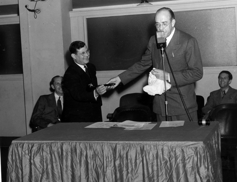 Stanton Griffis Hands a Gavel to an Unidentified Man | Harry S. Truman