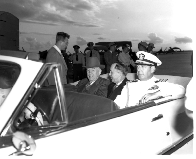 Senator Barkley, Leslie Biffle, and Captain Dennison in an open car at ...
