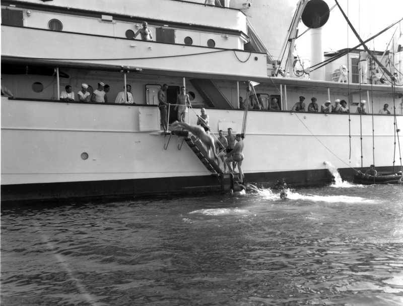 Sailors Dive Off the USS Williamsburg | Harry S. Truman