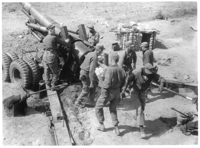 Soldiers Reload Howitzer | Harry S. Truman
