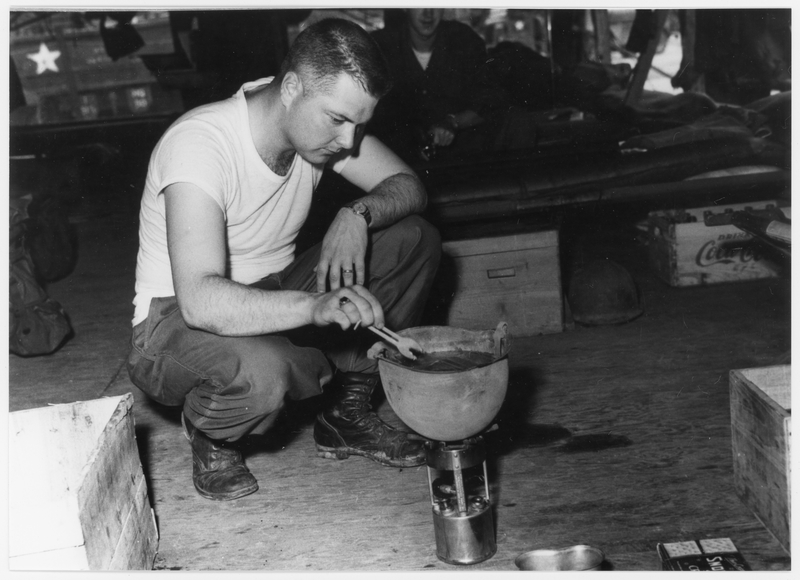 Soldier Cooking in Helmet | Harry S. Truman
