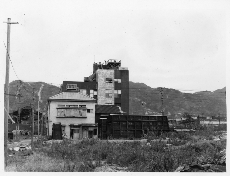 Taller Buildings Sustaining Damage from Incendiary Bombs Dropped on ...