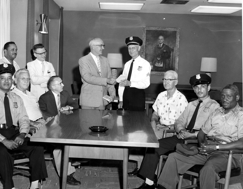 Presentation of booklets to Truman Library staff and security guards ...