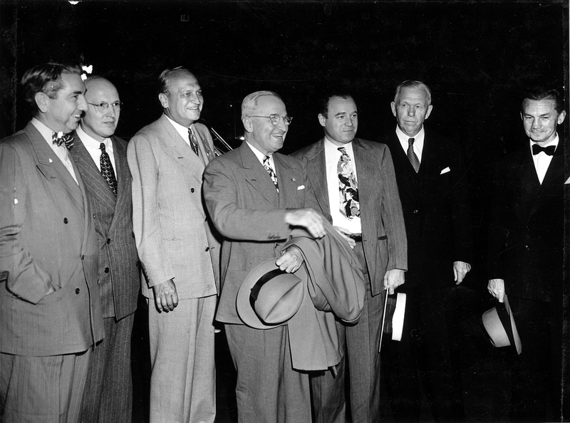 President Truman, with cabinet members, prepares to depart for his ...