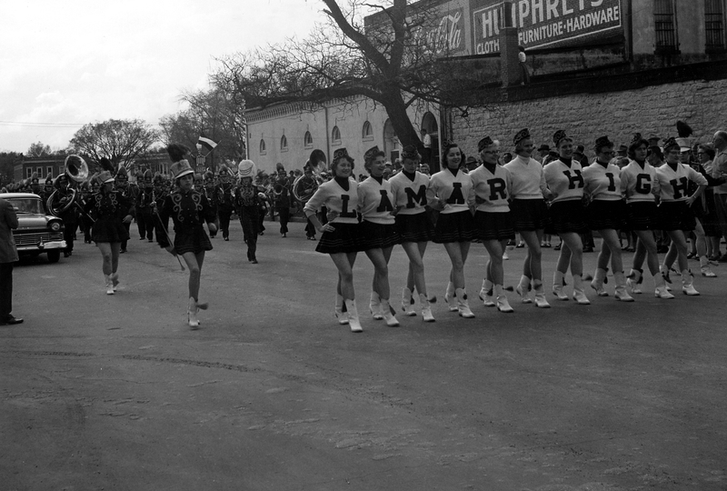 Cheerleaders and a band march at the dedication of Truman's birthplace ...