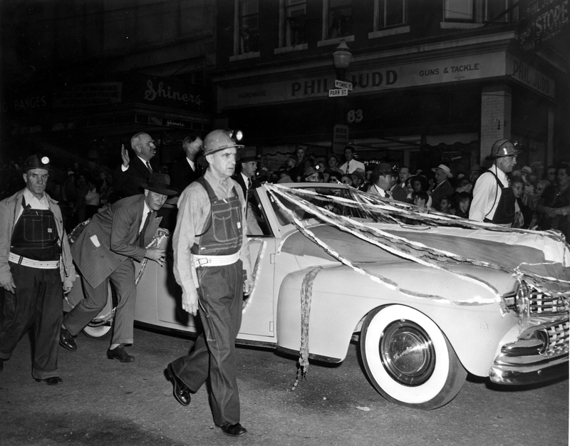 Truman in car, escorted by miners | Harry S. Truman