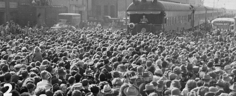 President Harry S. Truman speaking from a train on the campaign trail ...