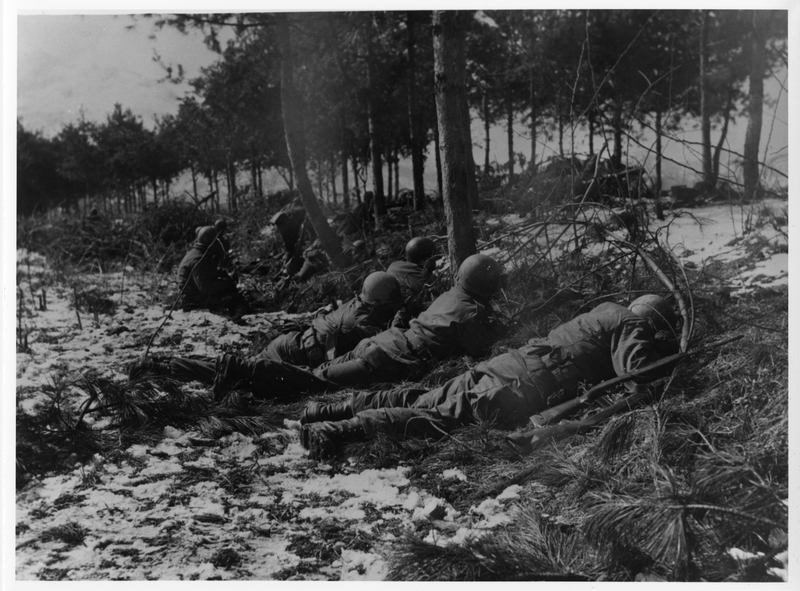Soldiers Lying on the Ground with their Weapons | Harry S. Truman