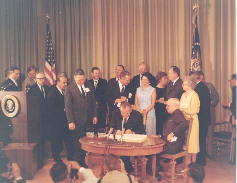 President Lyndon B. Johnson signing the Medicare Bill | Harry S. Truman