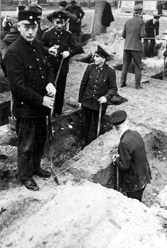 Germans digging graves | Harry S. Truman