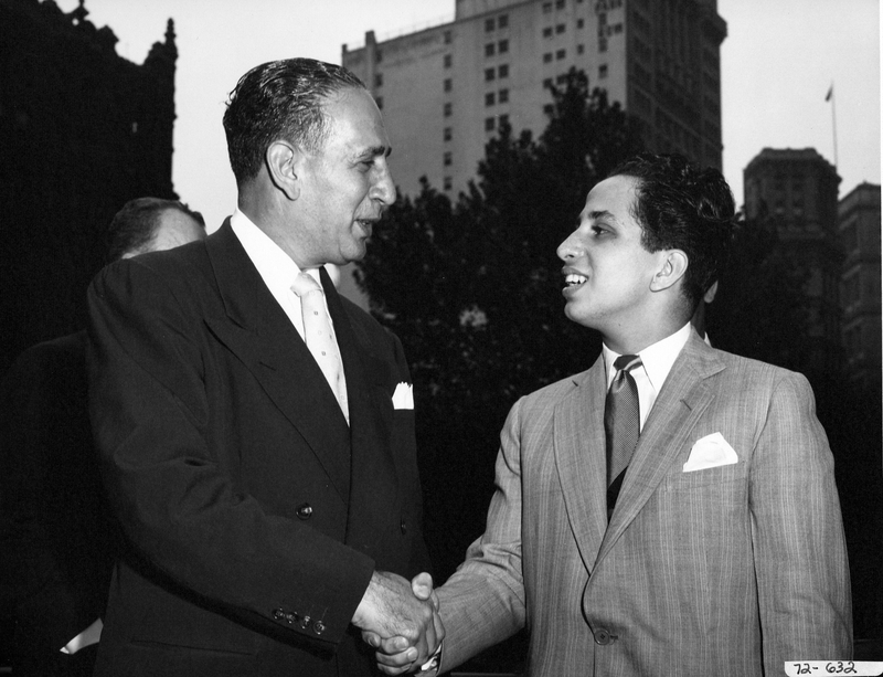 King Faisal speaking with Mayor Vincent R. Impellitteri | Harry S. Truman