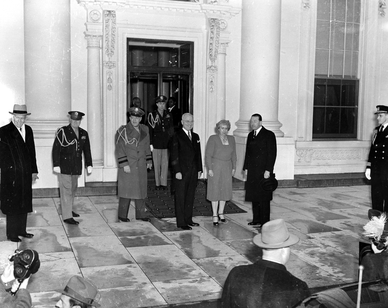 President Truman and Mrs. Truman standing outside the White House ...