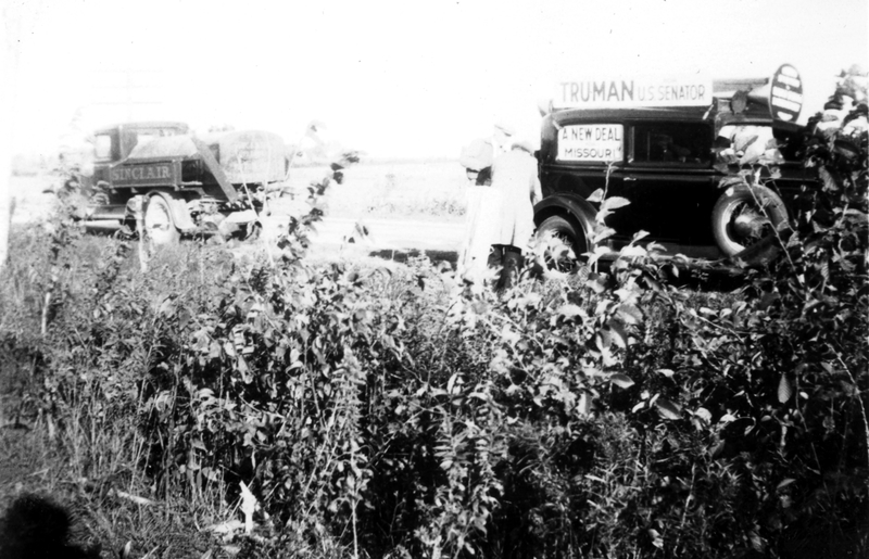 The 1934 senate campaign car with a Sinclair truck | Harry S. Truman