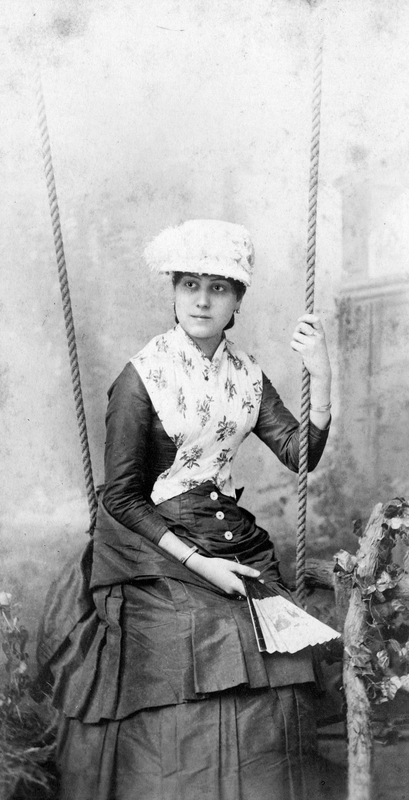 Madge Gates Wallace as a young woman posed on a swing | Harry S. Truman