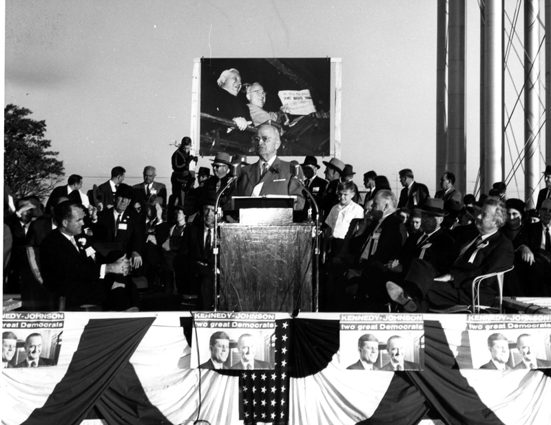Former President Truman stands at the podium with the famous "Dewey ...