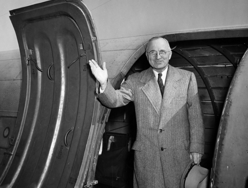 Senator Harry S. Truman, Vice-President Elect, waves his hand as he ...