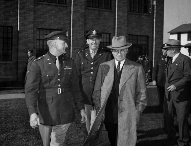 Senator Harry S. Truman met by several military men upon arrival in ...