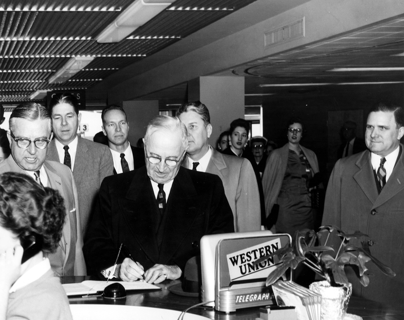 President Truman signing guestbook | Harry S. Truman