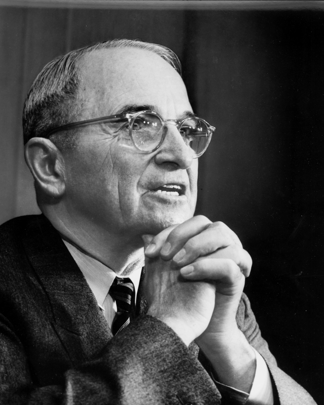 Portrait of Truman with hands folded as he speaks | Harry S. Truman