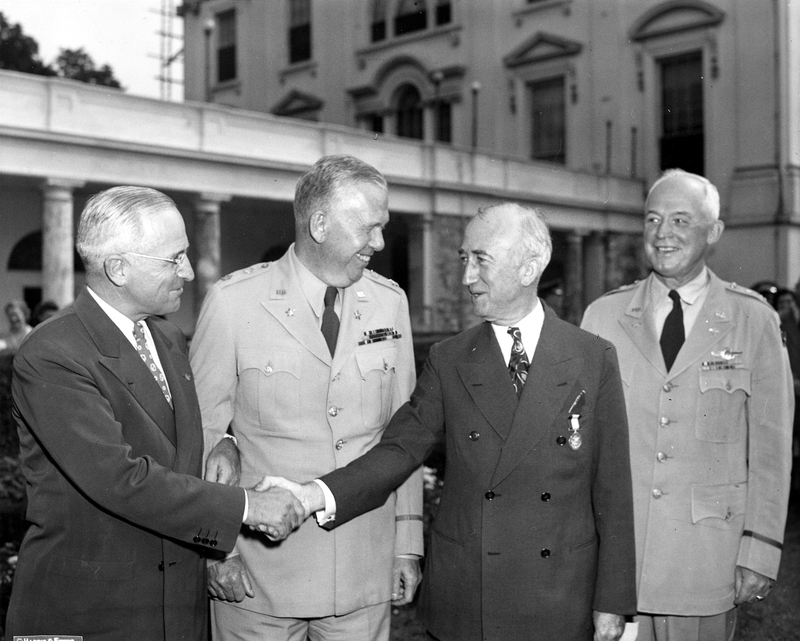 President Truman congratulates Secretary of State James F. Byrnes after ...