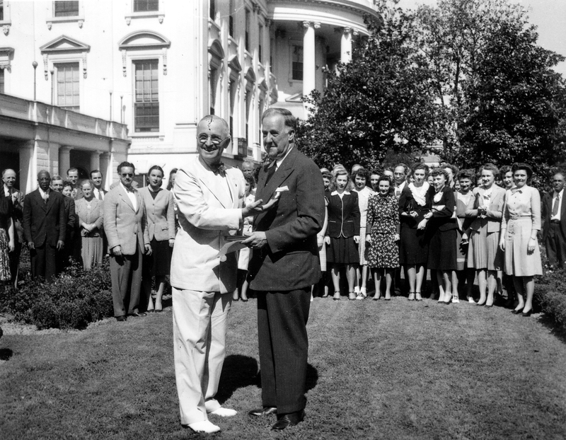 Photo of Pres. Truman presenting the Distinguished Service Medal to ...