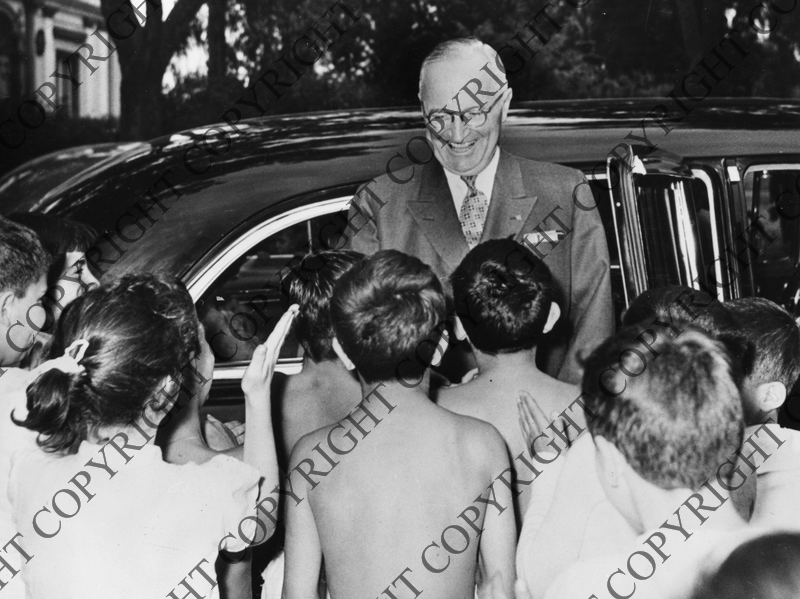 Former President Harry S. Truman with children from a school in Rome ...