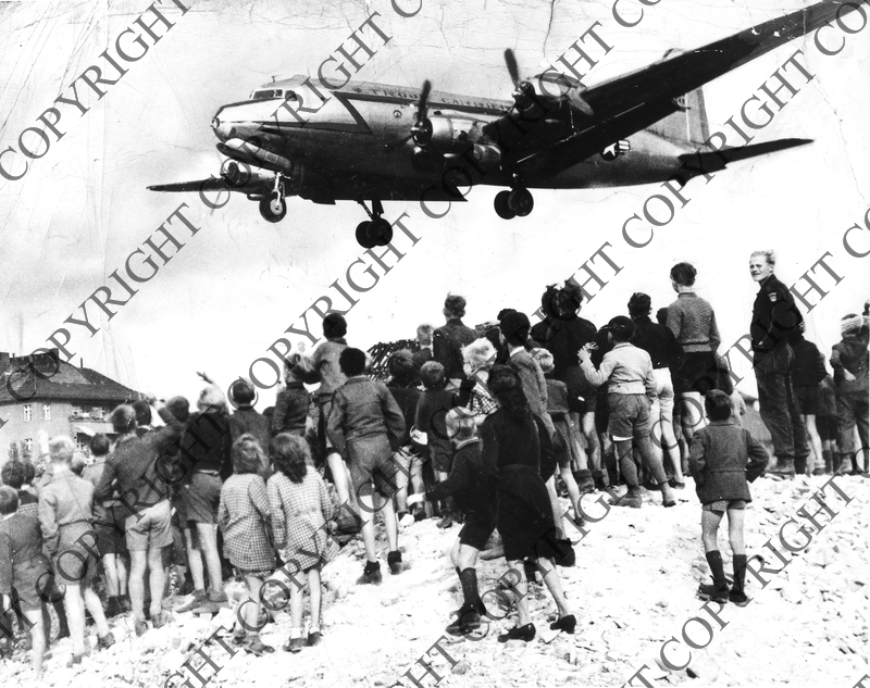 Berlin Airlift, Airplane Flies over Crowd | Harry S. Truman