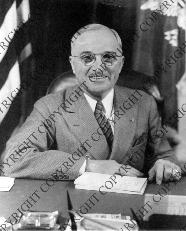 Truman seated at a desk | Harry S. Truman