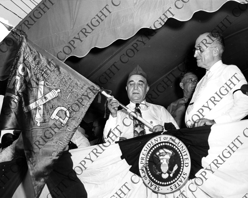 Truman with man holding 35th Division flag | Harry S. Truman