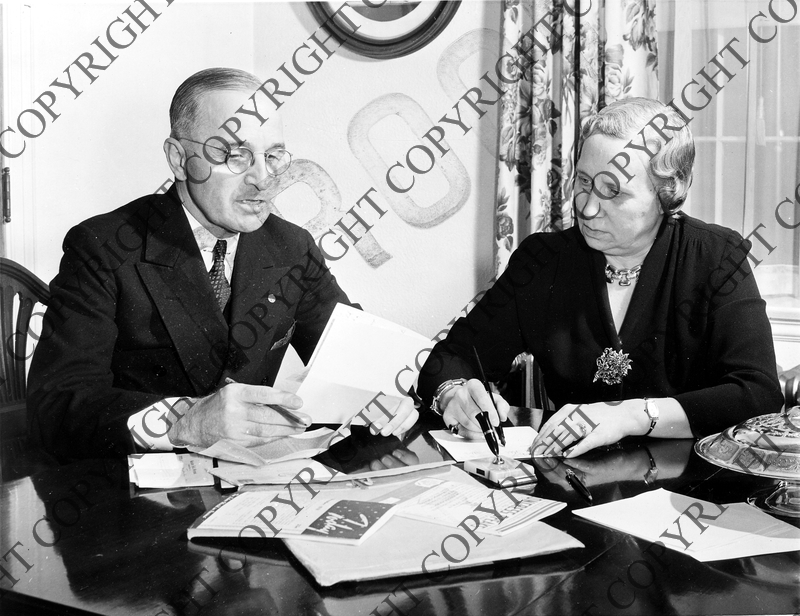 Mrs. Truman assisting Senator Truman with papers | Harry S. Truman