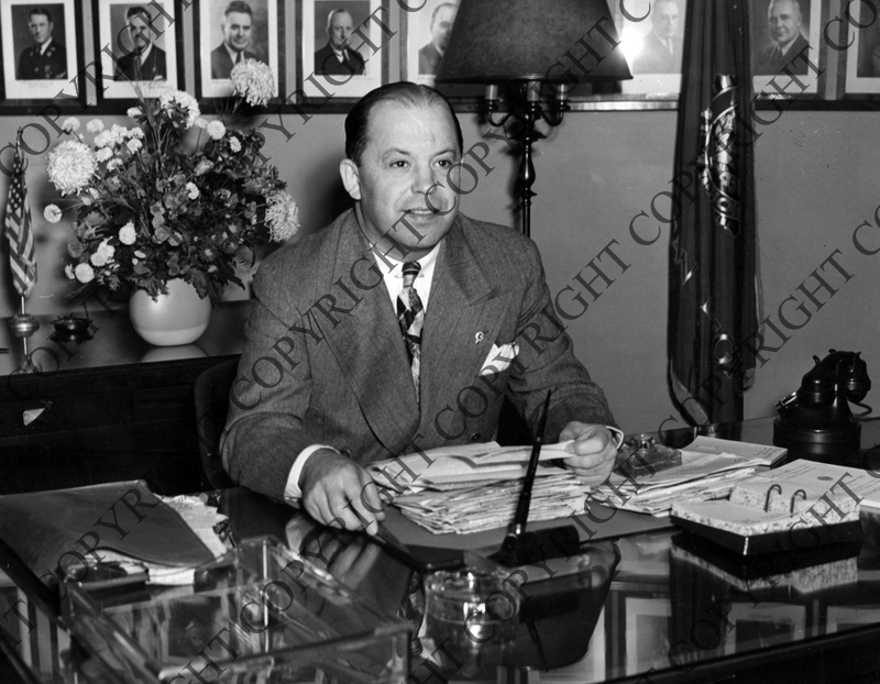 Paul H. Griffith, National Commander, American Legion, shown seated at ...
