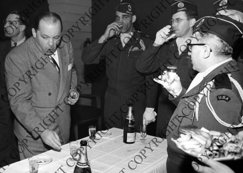 Assistant Secretary of Defense Paul Griffith shown with unidentified ...