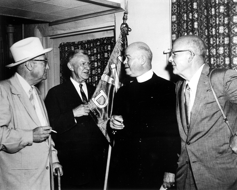 Father Tiernan and unidentified others at Library dedication reception ...