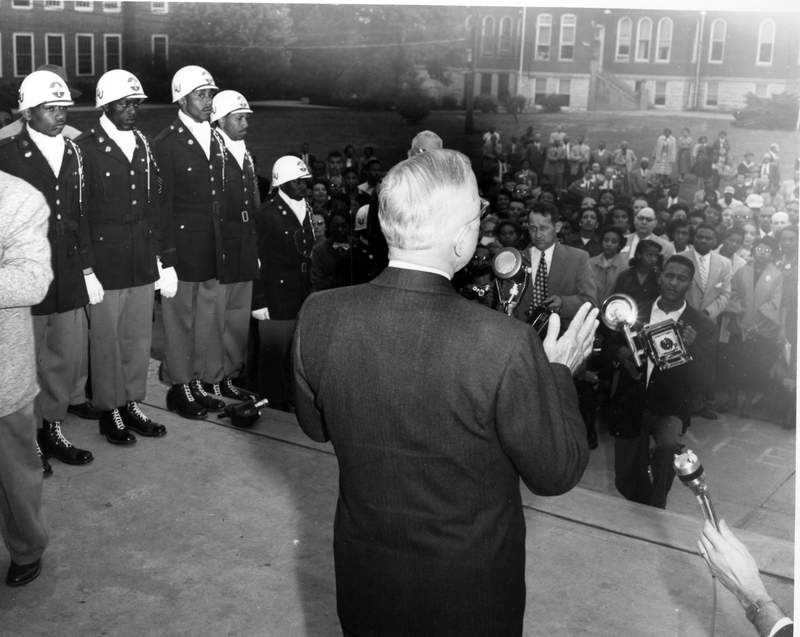 President Truman speaking at an unknown event before a bi-racial ...