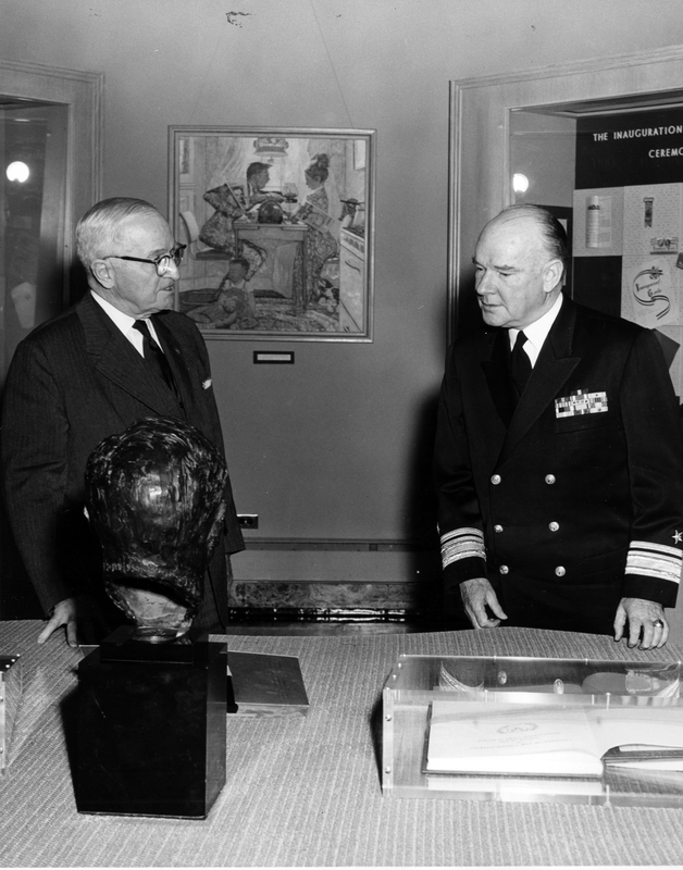 Former President Harry S. Truman and an unidentified Navy officer ...