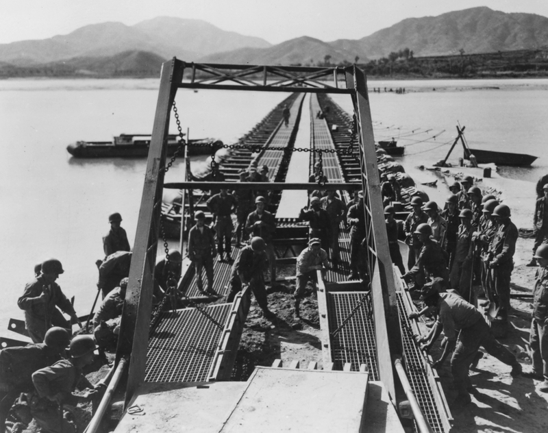 Construction of pontoon bridge near Waegwan, Korea during Korean War ...