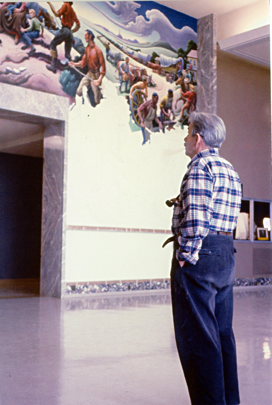 Thomas Hart Benton views the mural he is painting in the lobby of the ...
