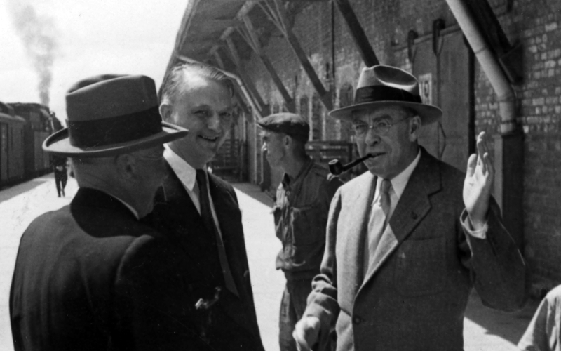 Stanton Griffis Waves at the Camera as he Talks with Others | Harry S ...