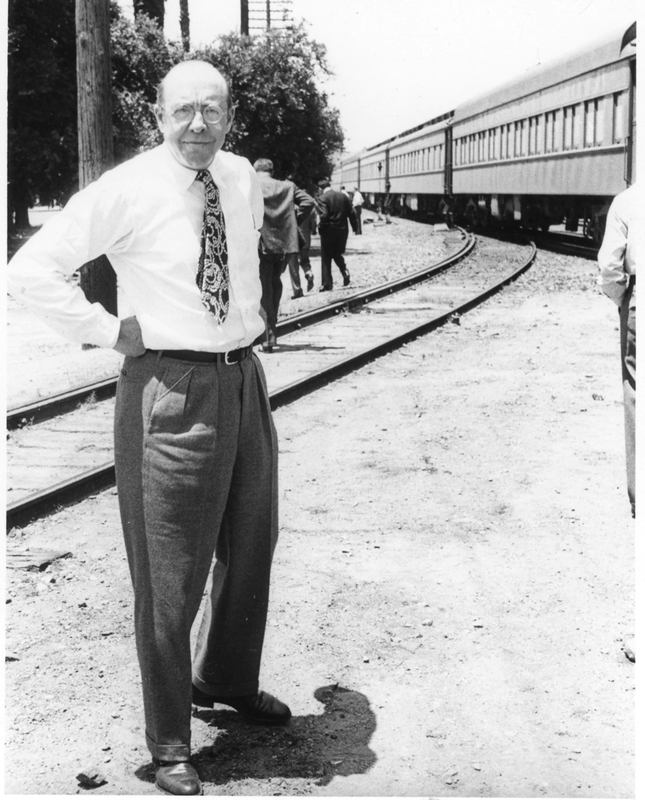 Stanton Griffis stands beside a train | Harry S. Truman