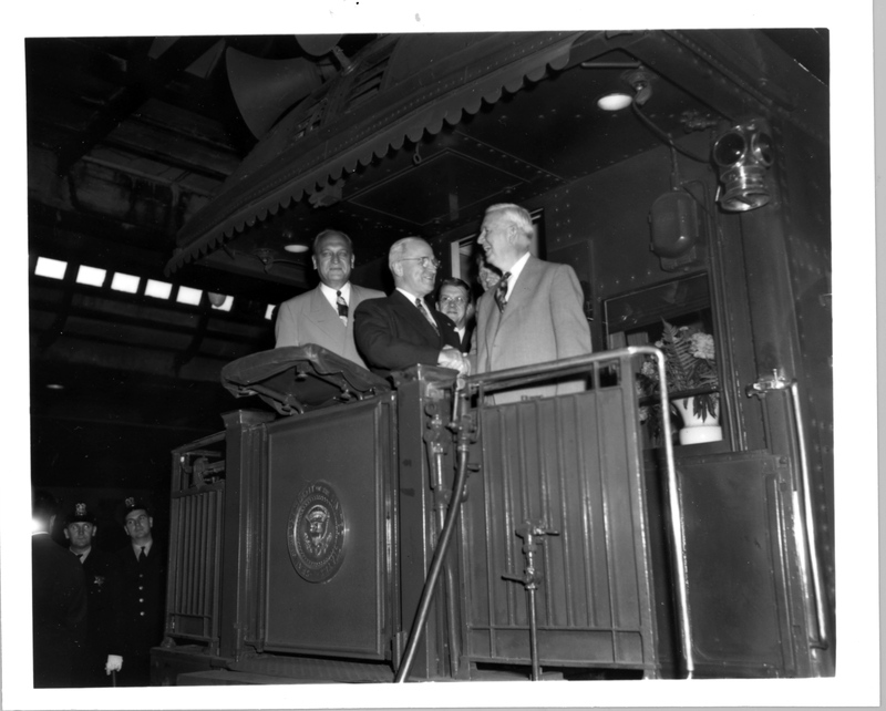 President Truman and others on the rear platform of a train in Chicago ...