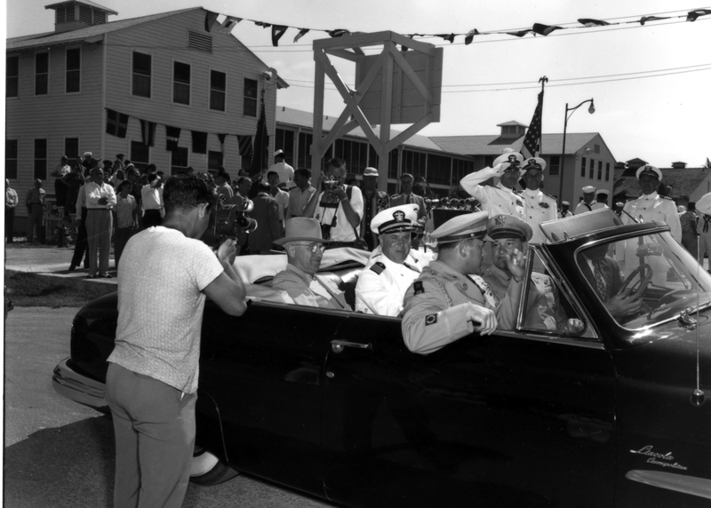 President Truman and others in a motor car returning to the Little ...