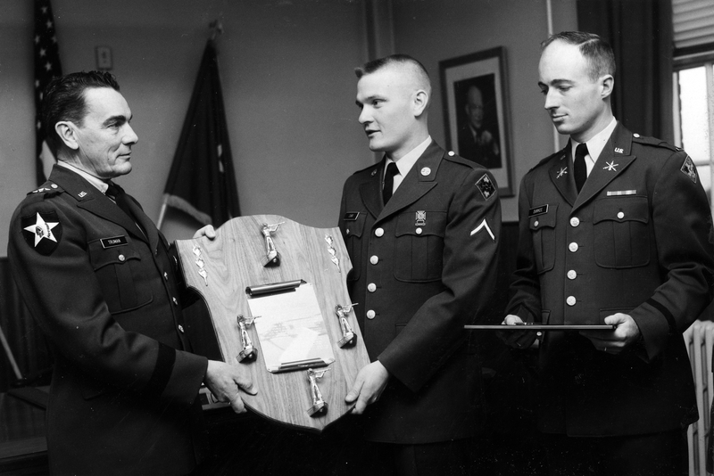 Private Calvin H. Carr Accepts a Plaque for His Unit from Major General ...