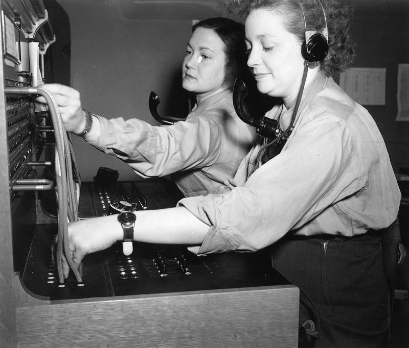 Two Members of the Women's Army Corps (WACs) Working at the Telephone ...