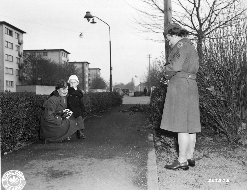 A Member of the Women's Army Corps (WAC) Poses with a German Orphan ...