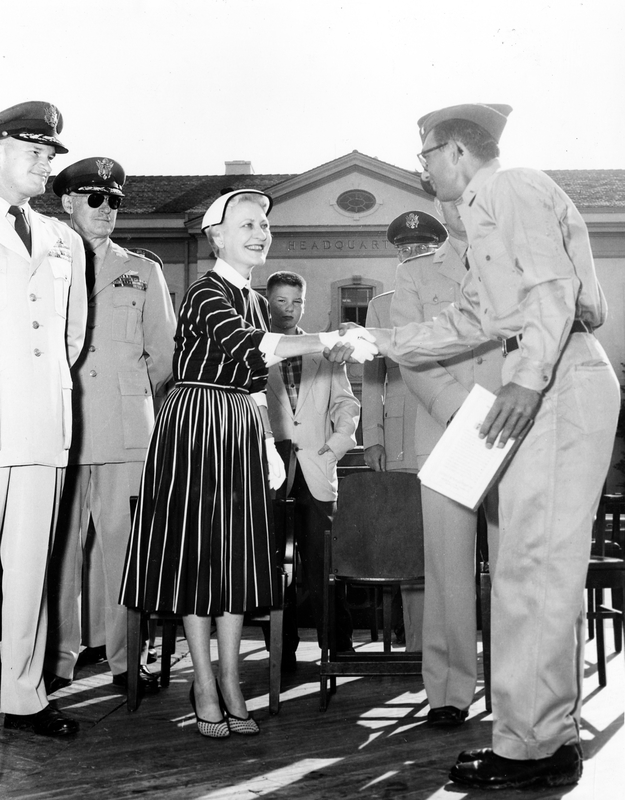 Mrs. Landry Shakes Graduate's Hand | Harry S. Truman